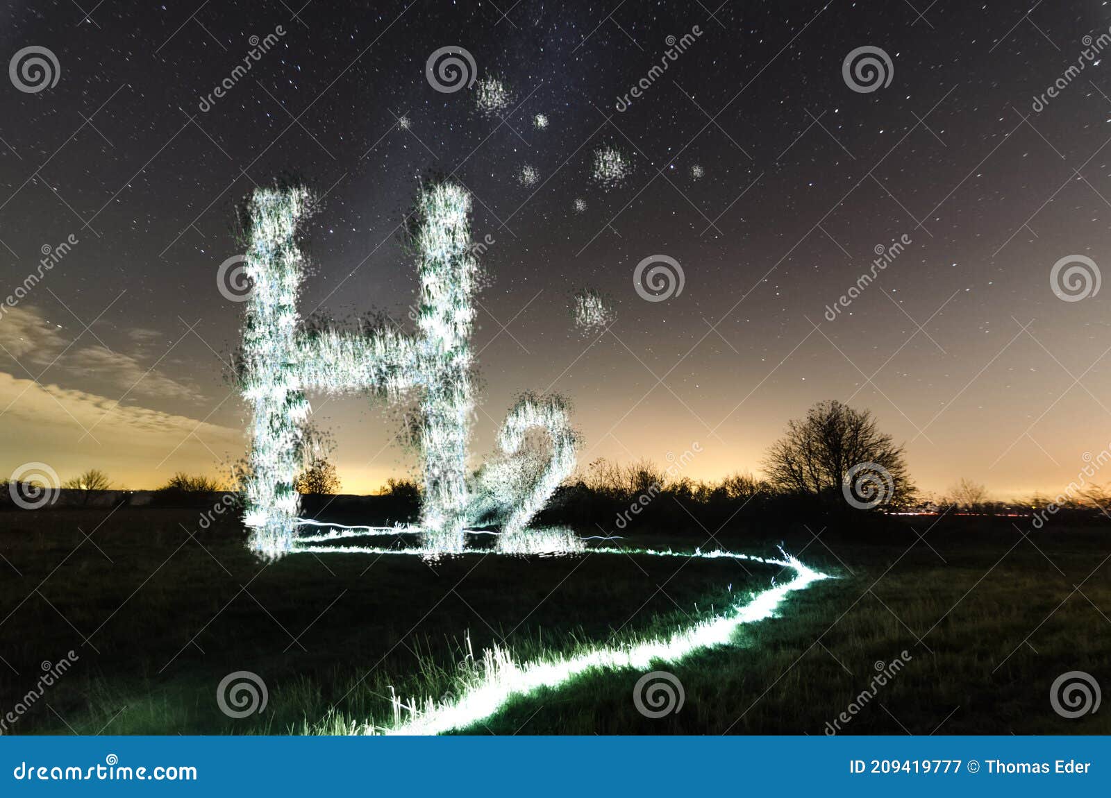 Burning Hydrogen H2 Letters with a Light Trail and Starry Sky Stock ...
