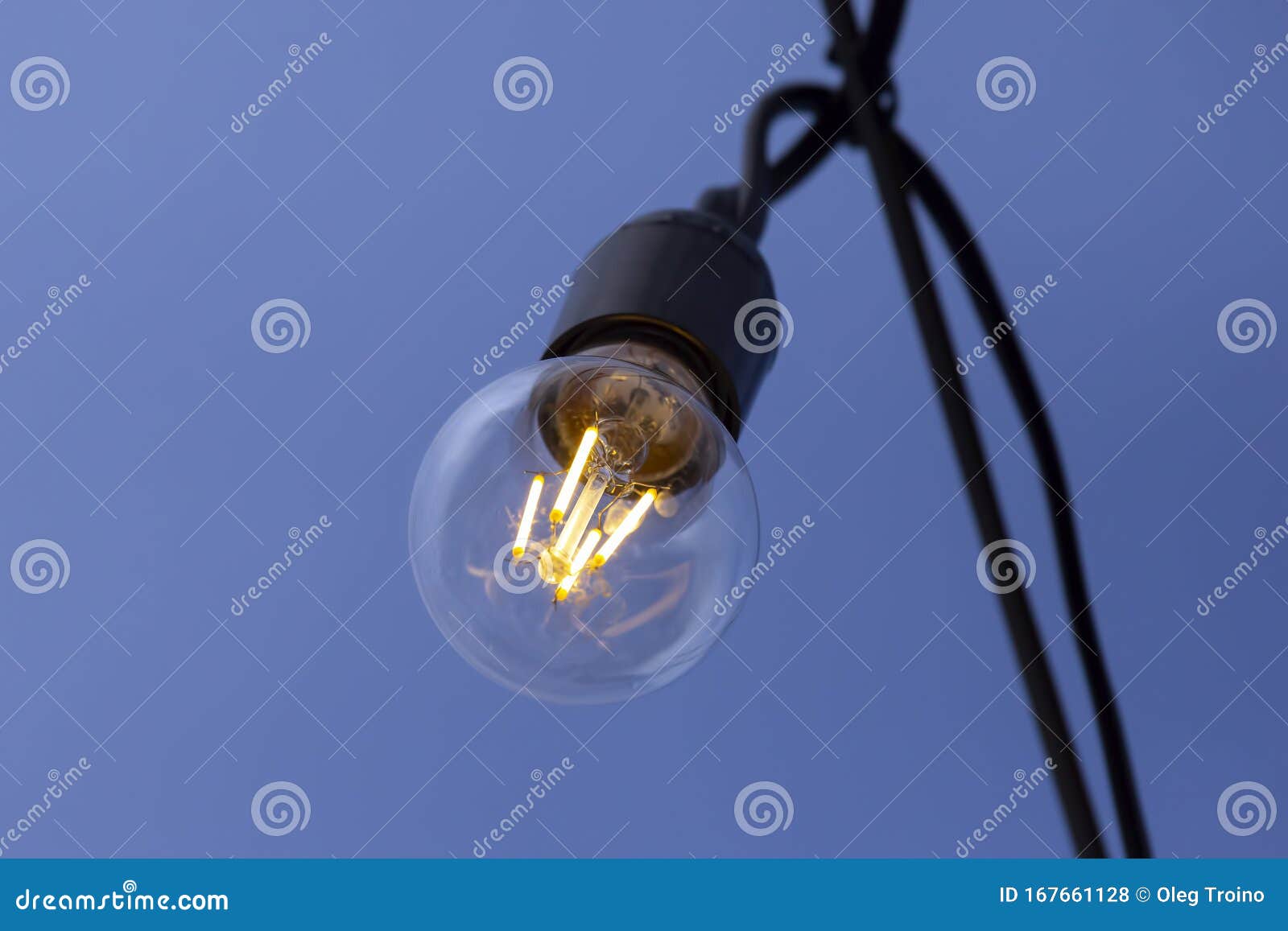 Burning Lamp on the Background of Blue Sky Stock Photo - Image of ...