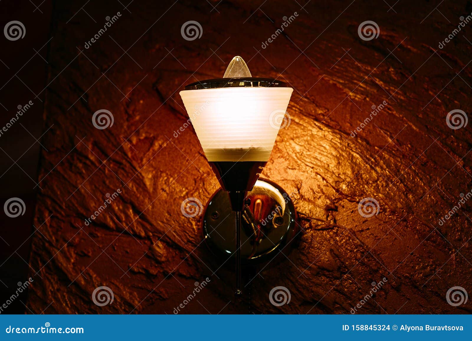 Burning lamp on the wall stock photo. Image of light - 158845324