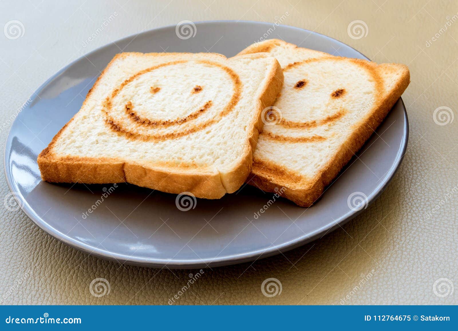 Burning Line As Happy Face on Bread Sheet Stock Image - Image of ...