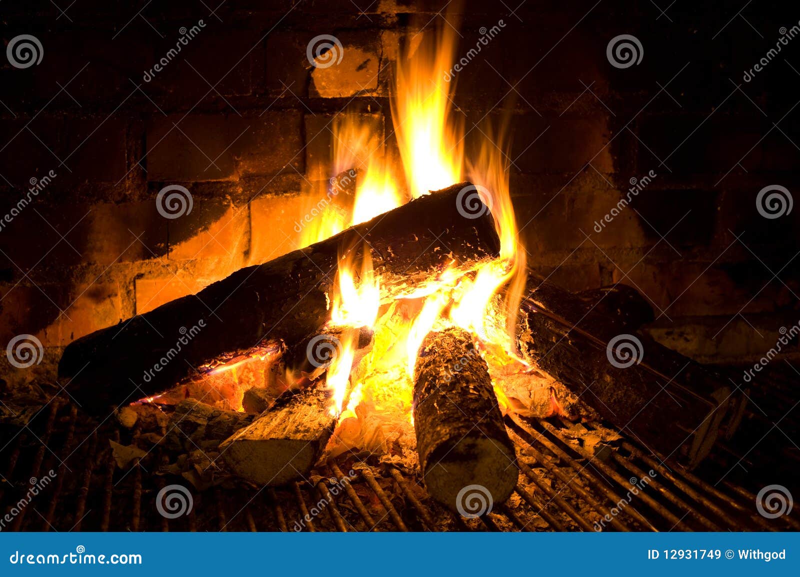 Burning logs stock image. Image of firing, brick, comfort - 12931749