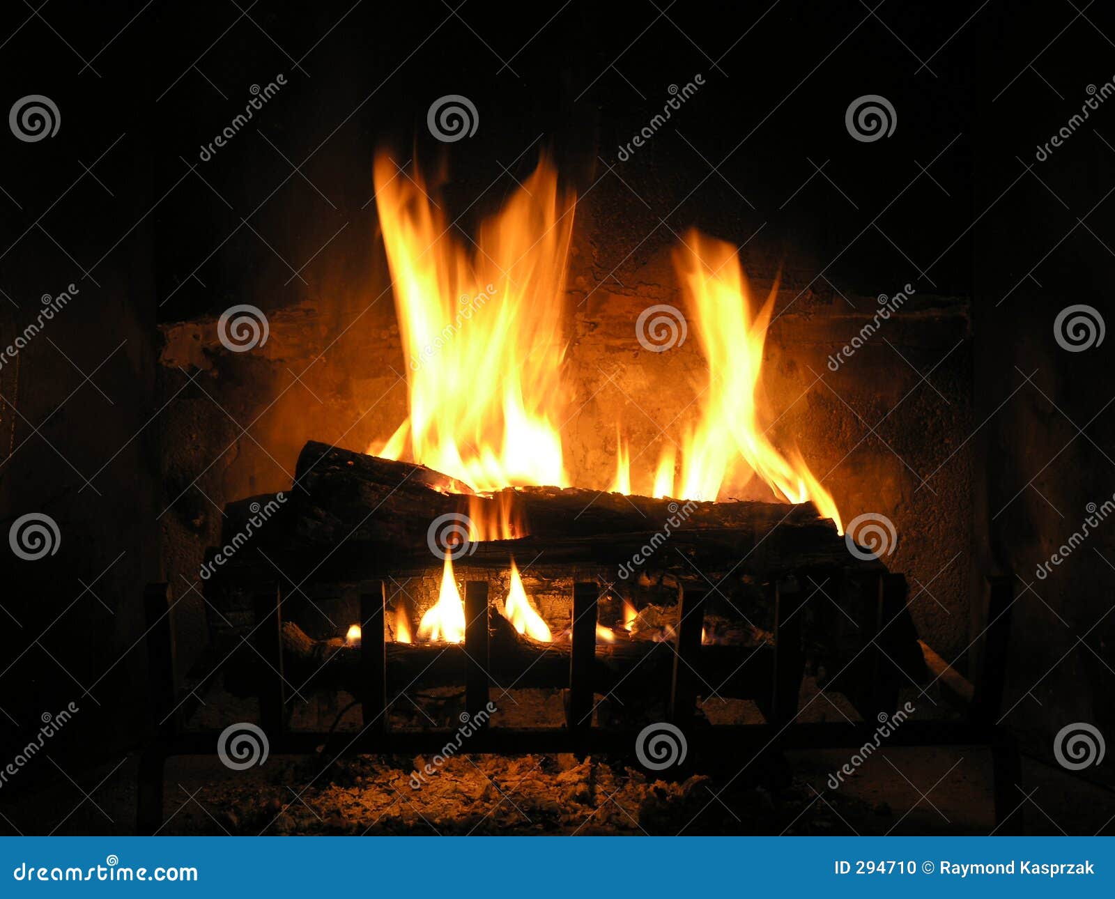 Burning Logs stock photo. Image of flame, energy, fireplace - 294710