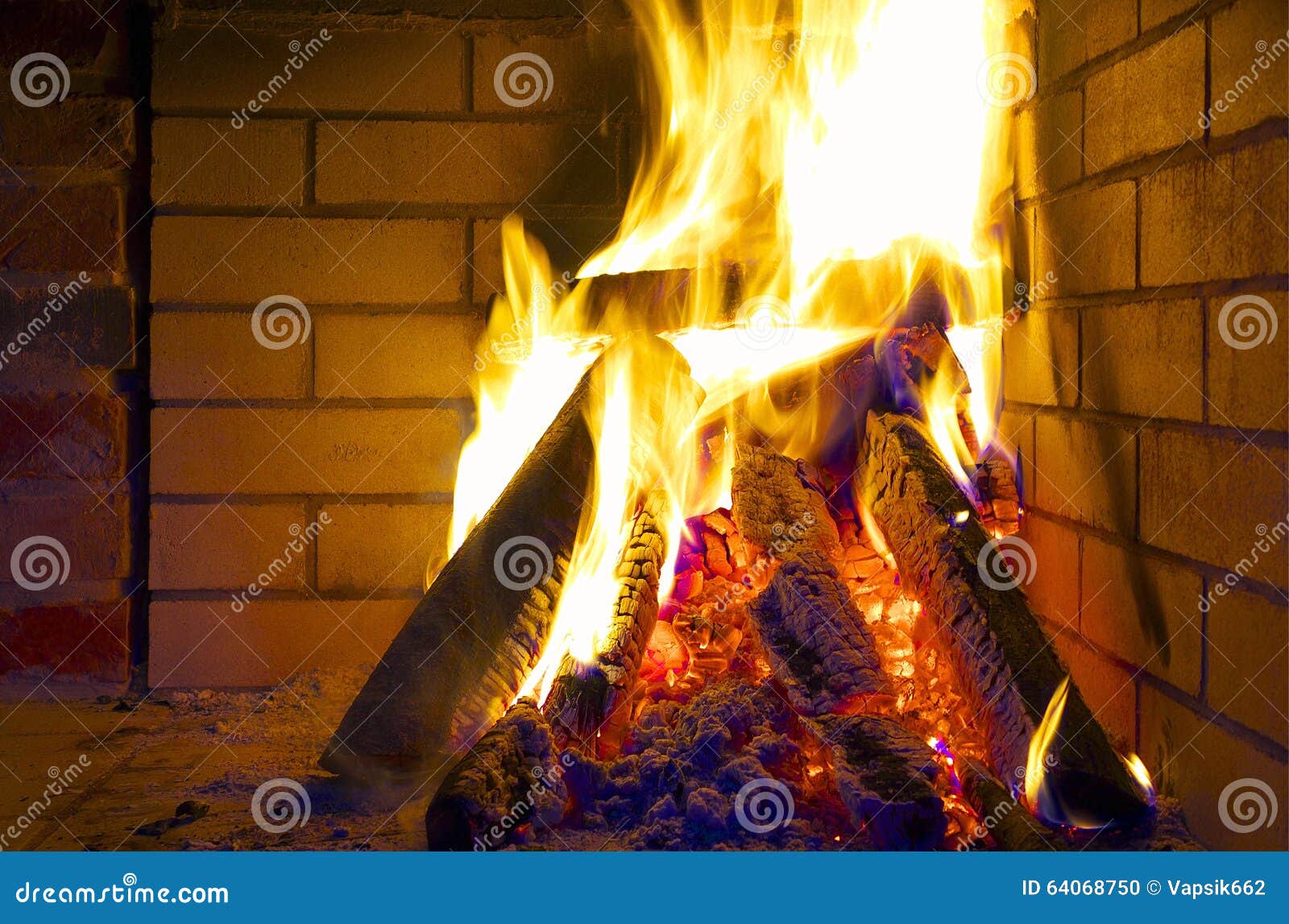 Burning logs in fireplace. stock photo. Image of risk - 64068750