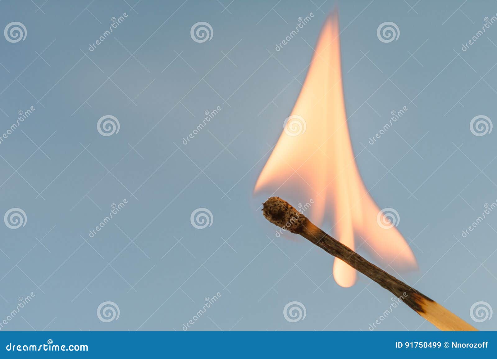 Burning Match on a Blue Background Stock Image - Image of detail, black ...