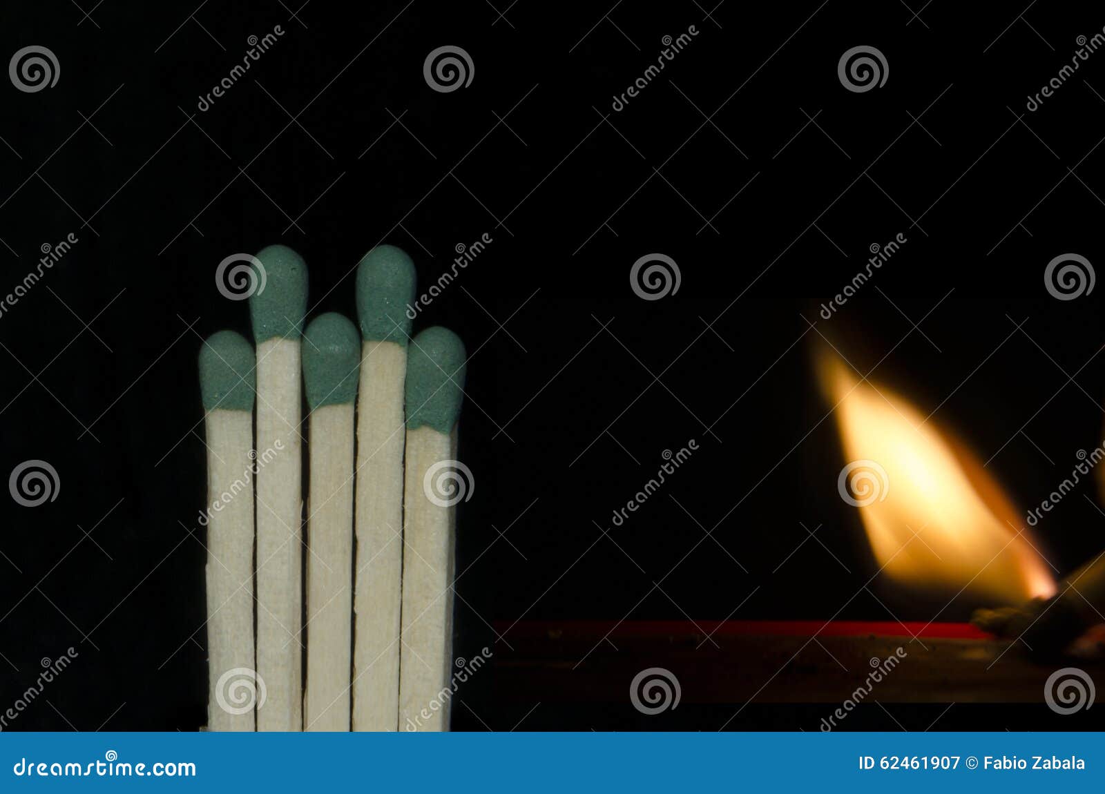 A Row Of Burning Matches On A Black Background. The Flame Moves From ...
