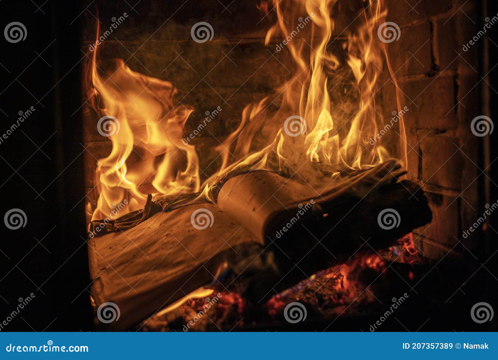 Burning Notebook Weekly in the Fireplace, Last Year, Horizontal Stock ...