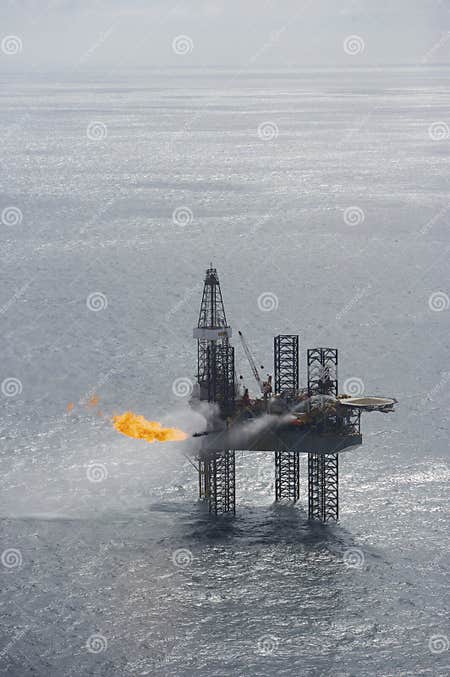 Burning off gas on a rig stock photo. Image of warming - 18725102