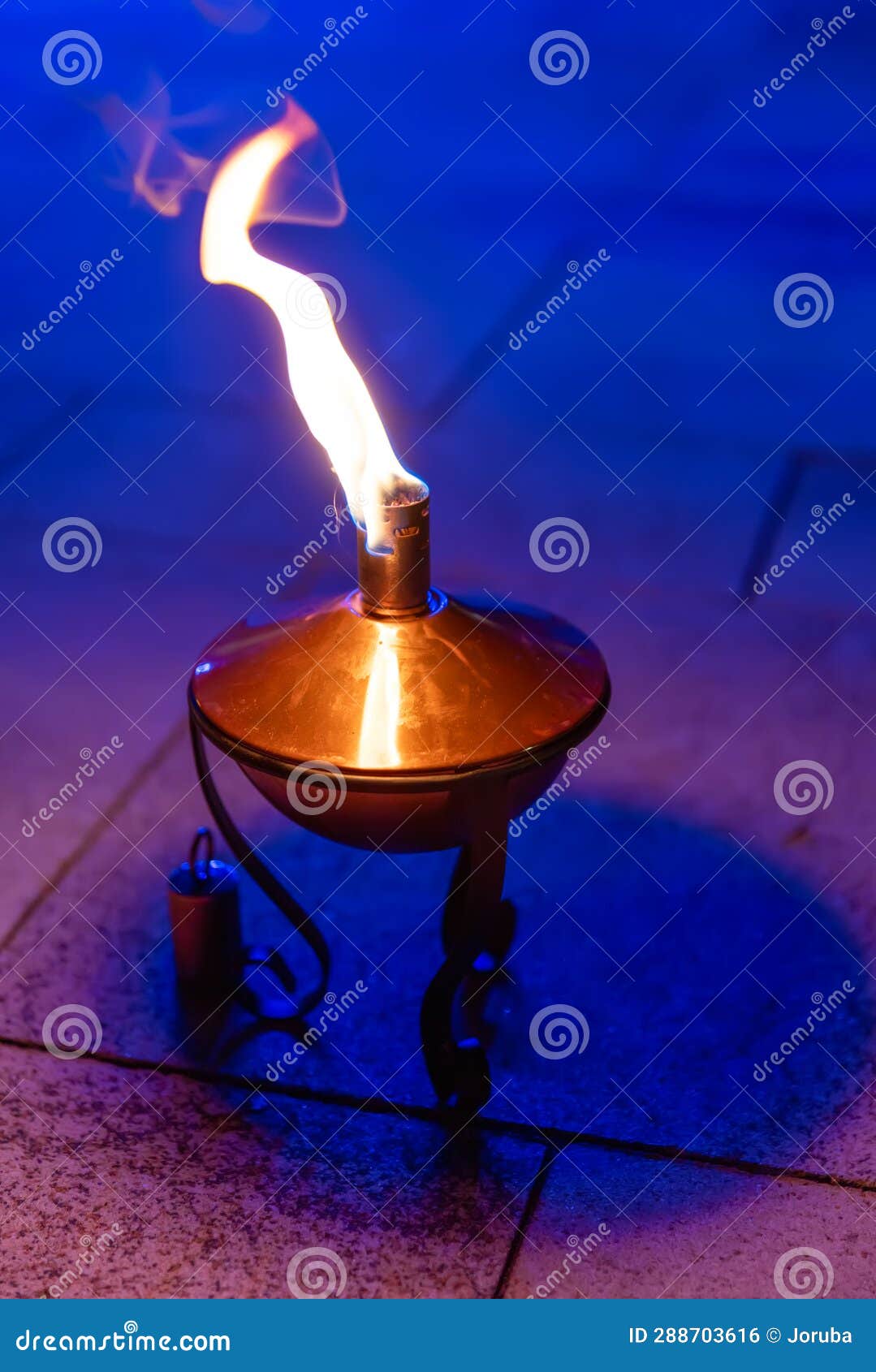 Burning Oil Lamp on Floor at Evening Stock Photo - Image of evening ...