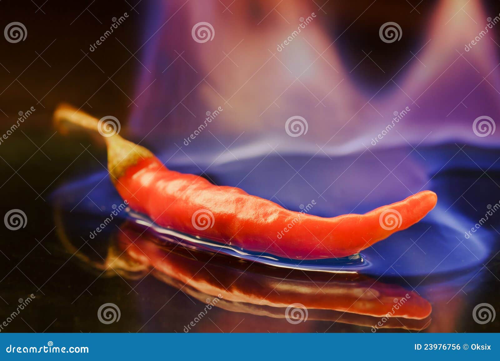 Burning pepper stock photo. Image of color, food, black - 23976756