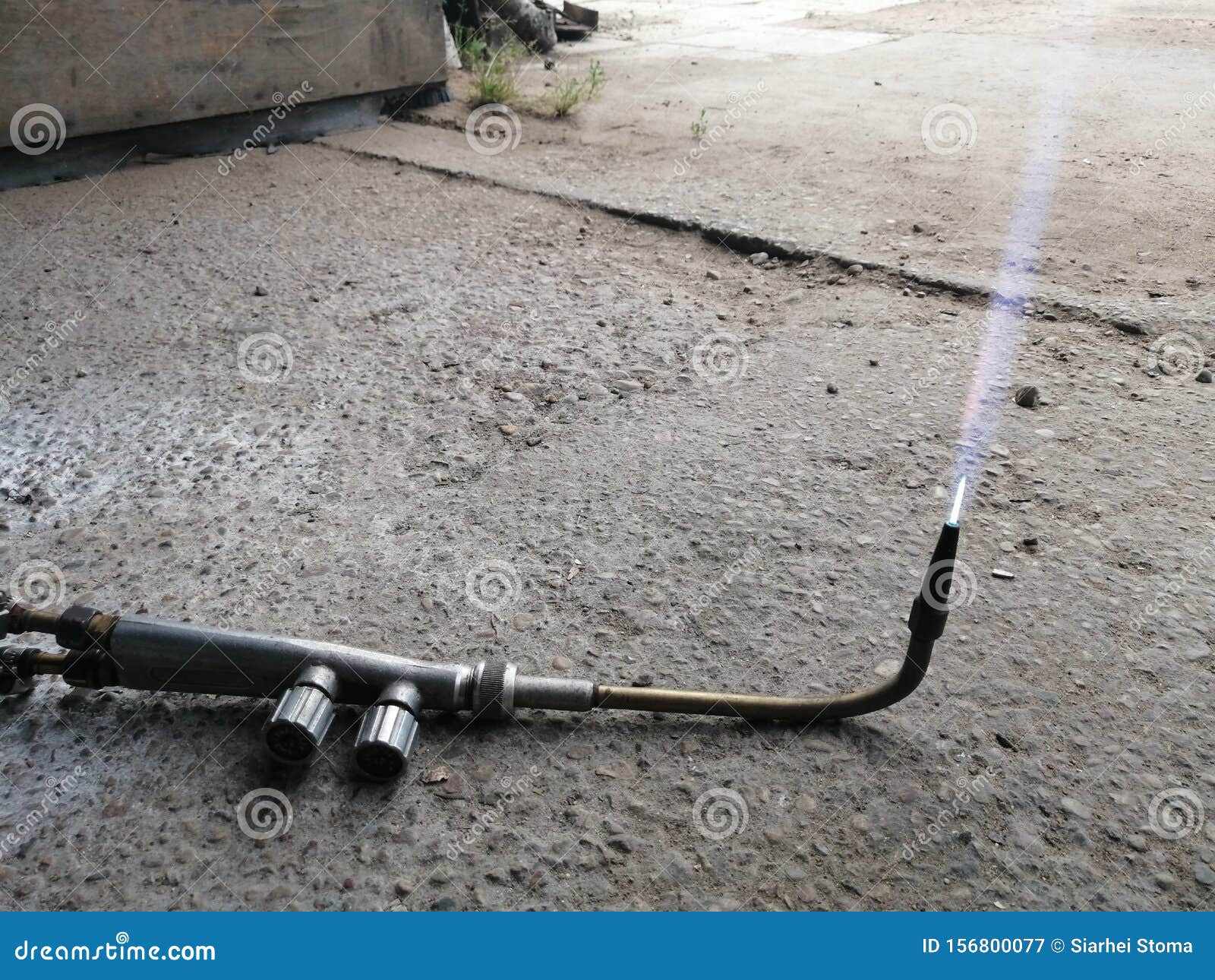 Burning Process of an Autogen Lying on a Concrete Floor Stock Image ...