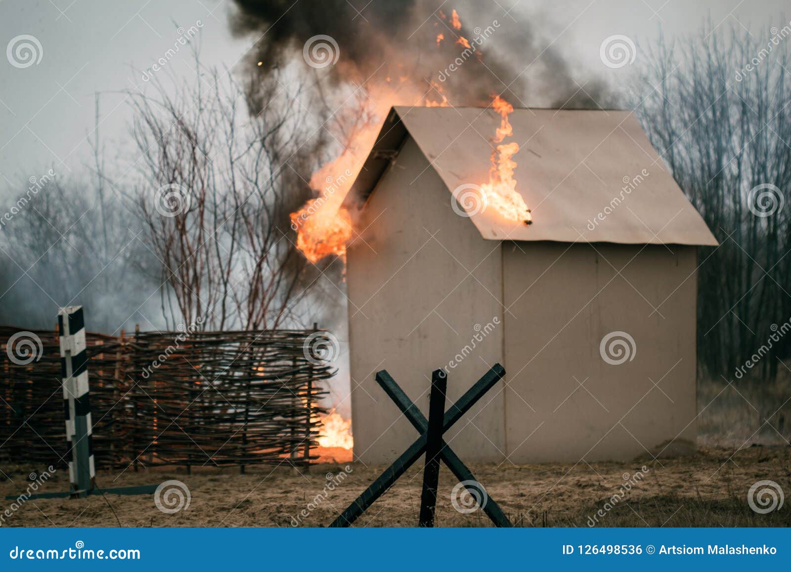 Burning props in the field stock photo. Image of fire - 126498536