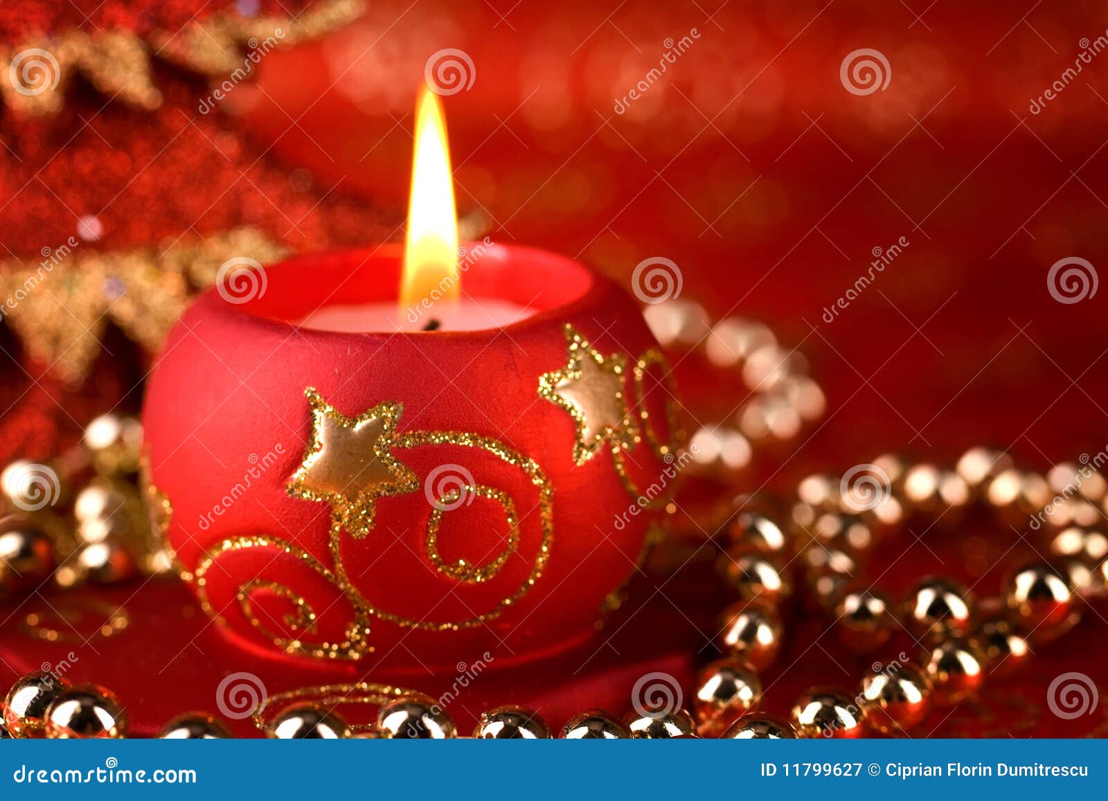 Burning red candle stock image. Image of festive, colors - 11799627