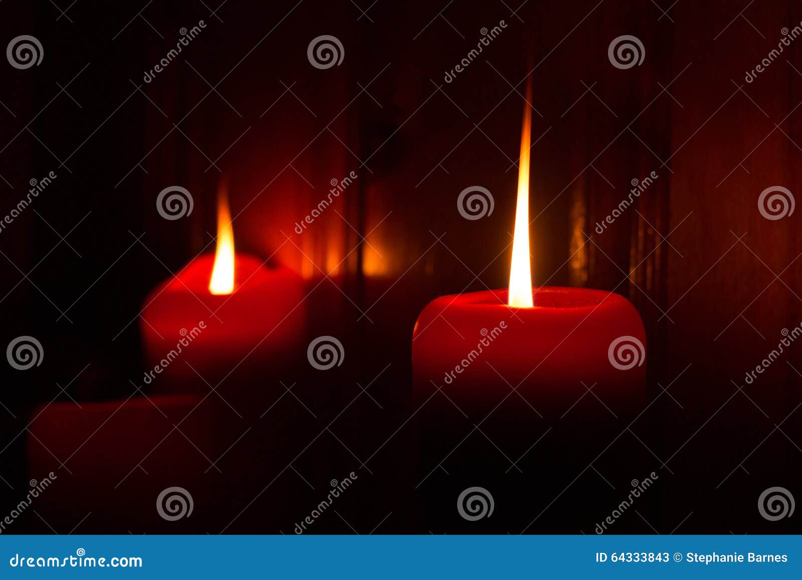 Burning Red Candles stock image. Image of glow, burn - 64333843