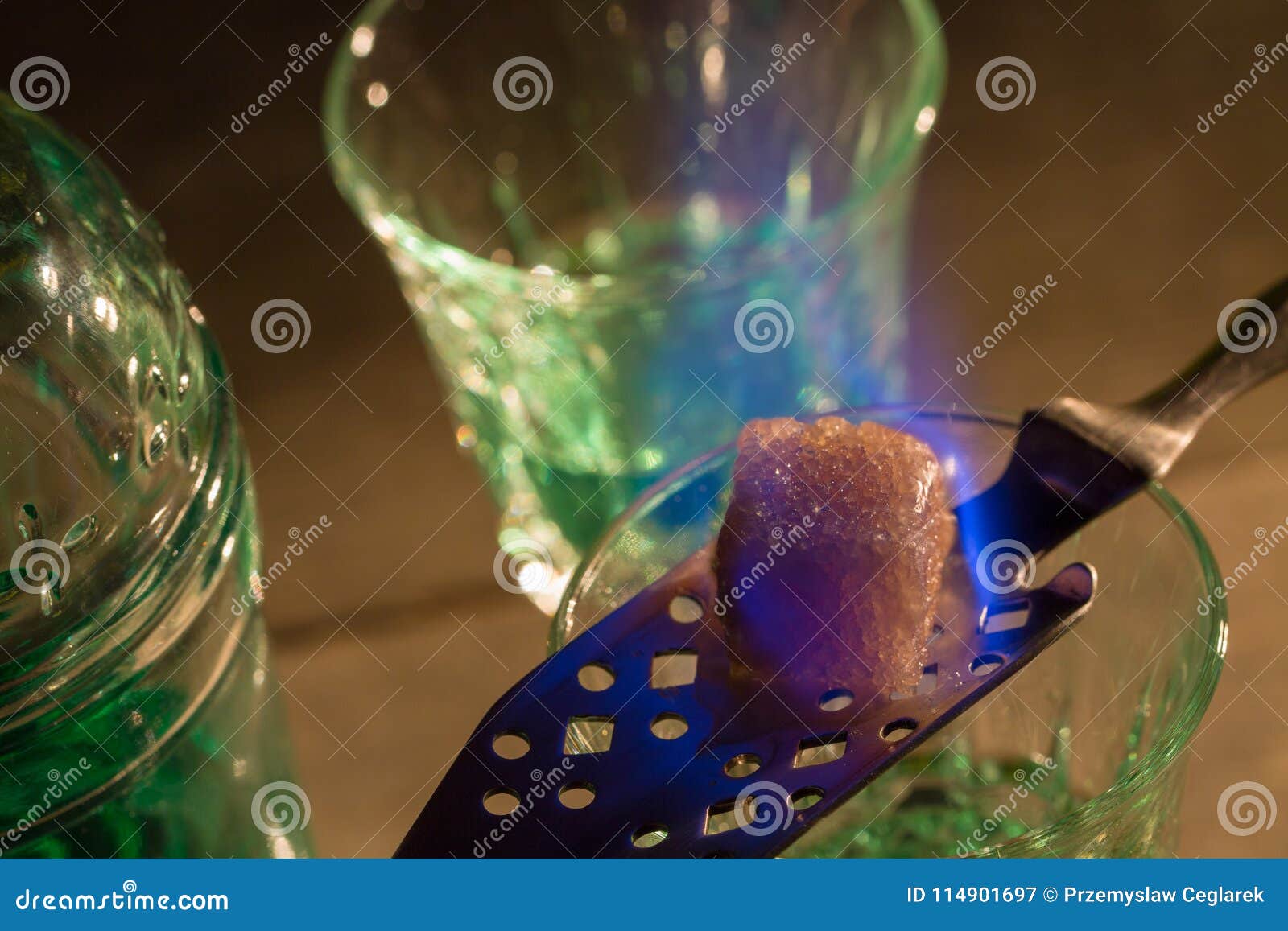 Burning Sugar on Spoon in Glass of Absinthe Stock Image - Image of ...