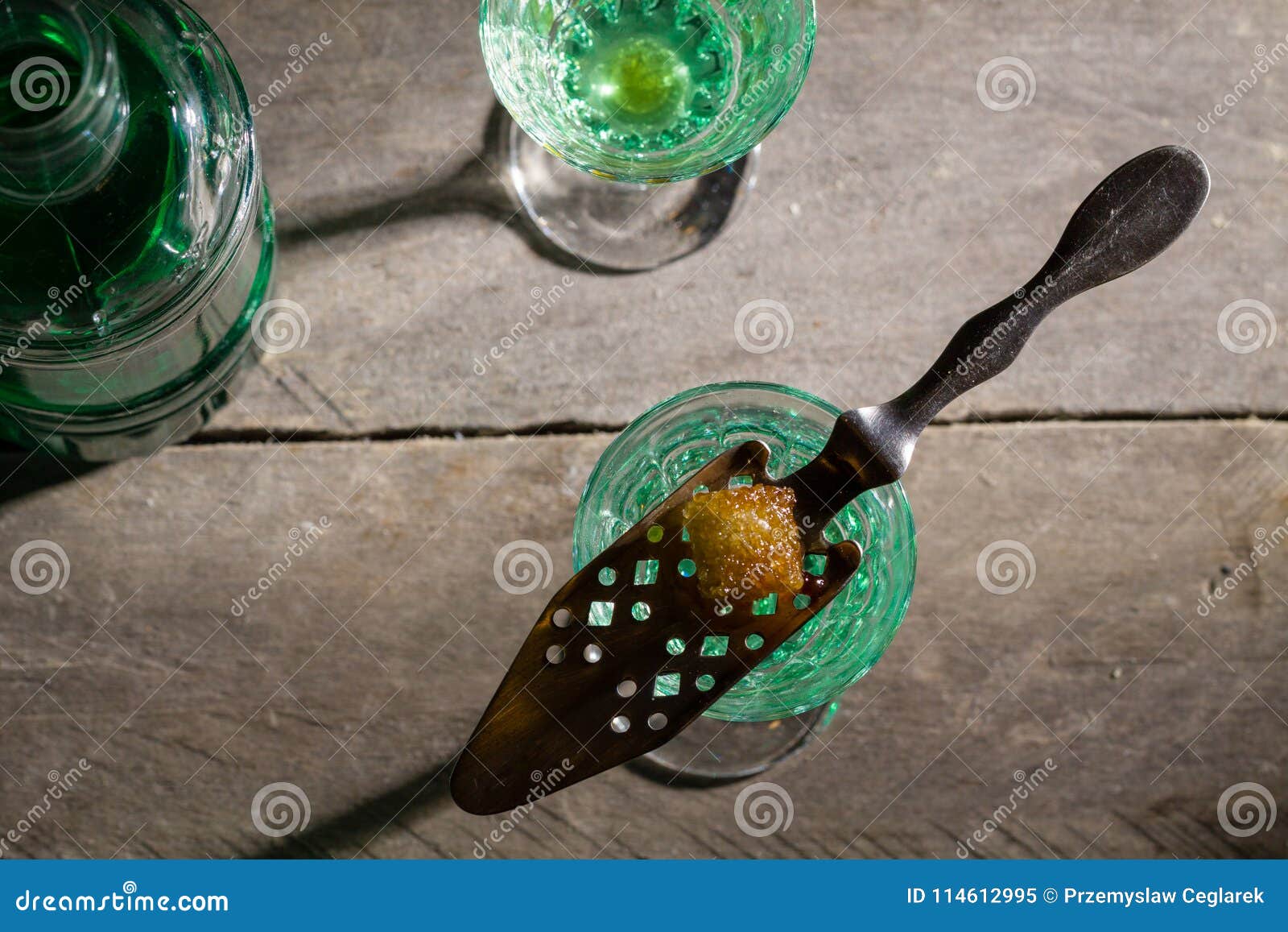 Burning Sugar on Spoon in Glass of Absinthe Stock Image - Image of ...