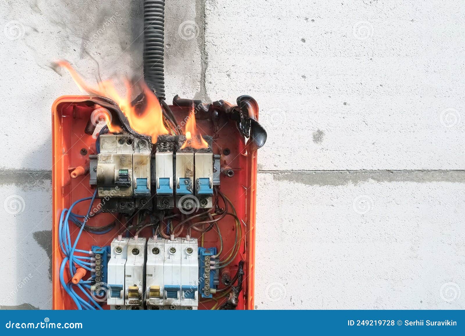 Burning Switchboard from Overload or Short Circuit on the Wall Stock ...