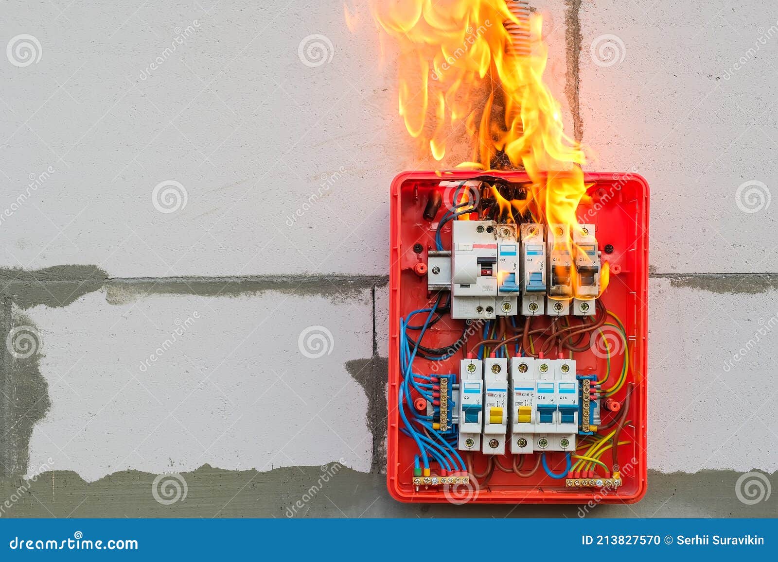 Burning Switchboard from Overload or Short Circuit on Wall Closeup ...