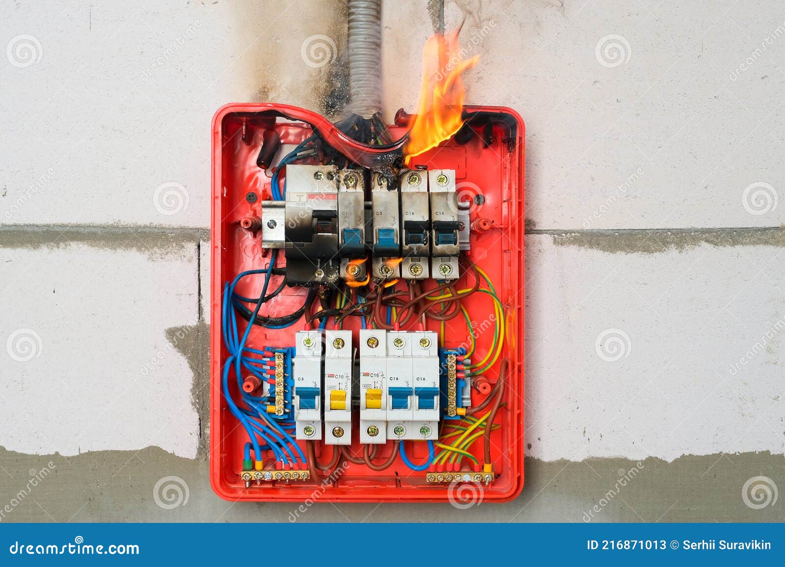 Burning Switchboard from Overload or Short Circuit on Wall Closeup ...