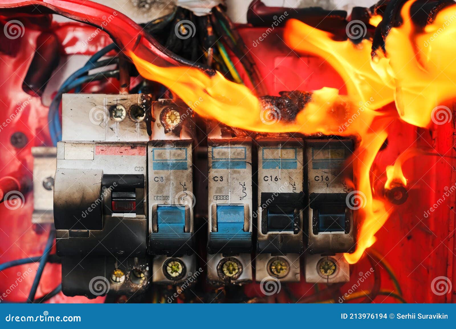 Burning Switchboard from Overload or Short Circuit on Wall Closeup ...