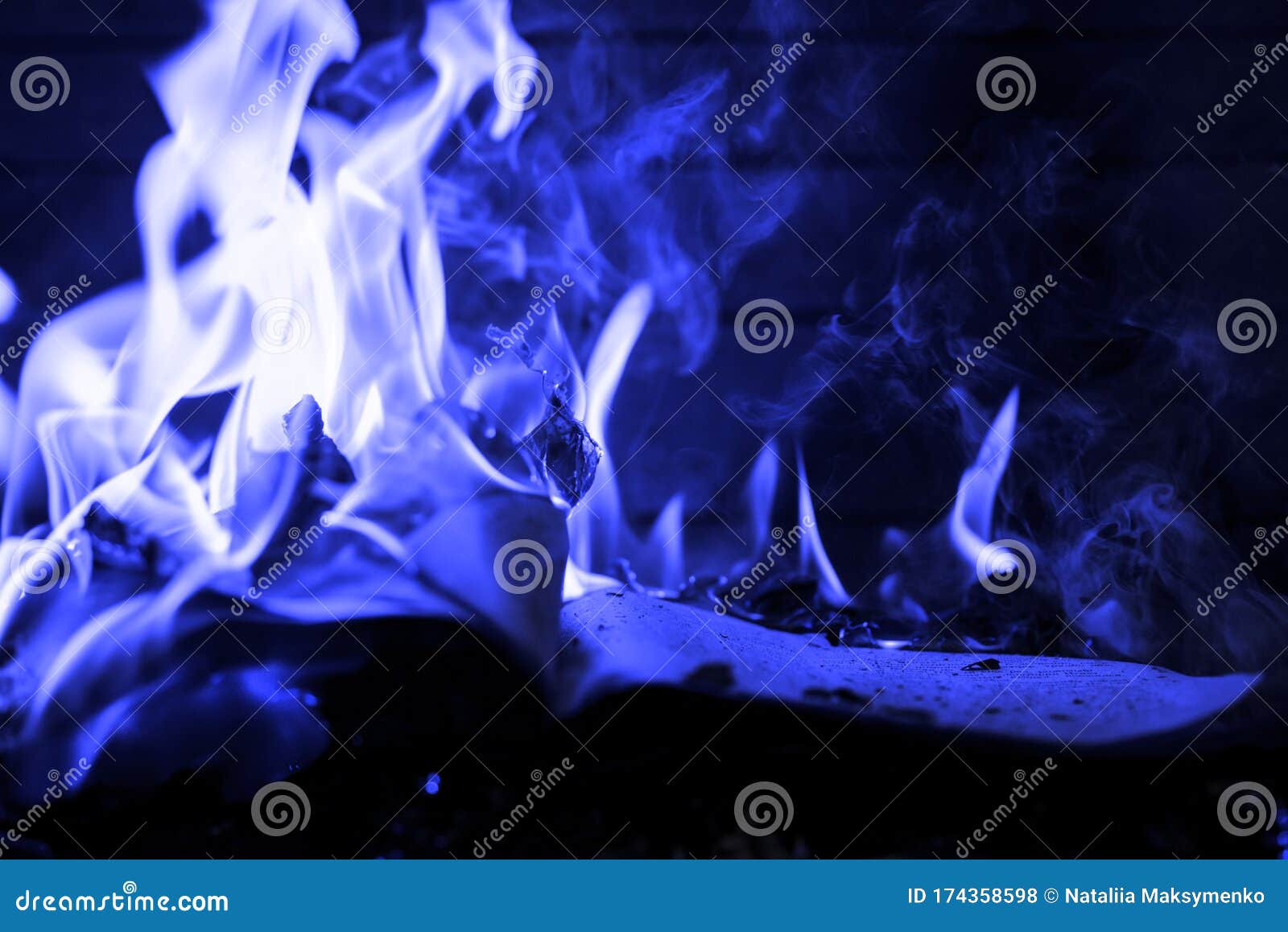Burning Thoughts, News. Books in a Blue Flame of Fire. Background from ...