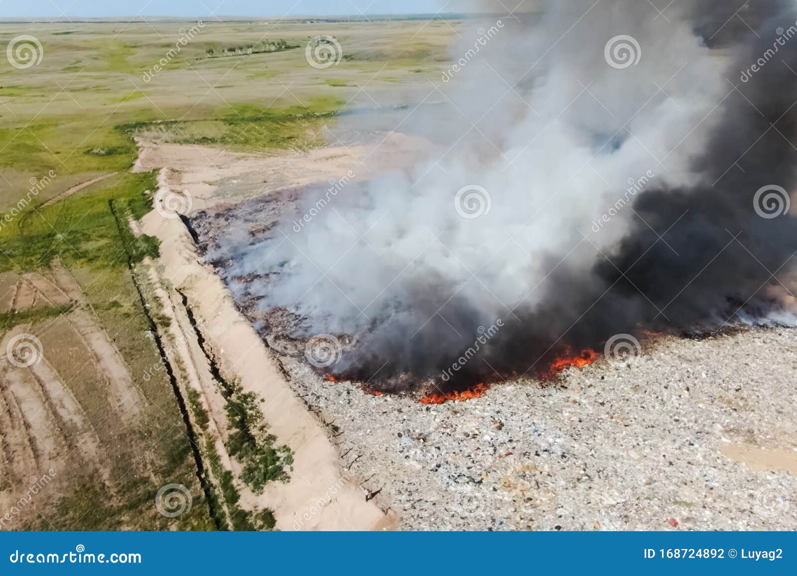 Burning Trash. Fire at the Landfill Stock Photo - Image of dirty ...