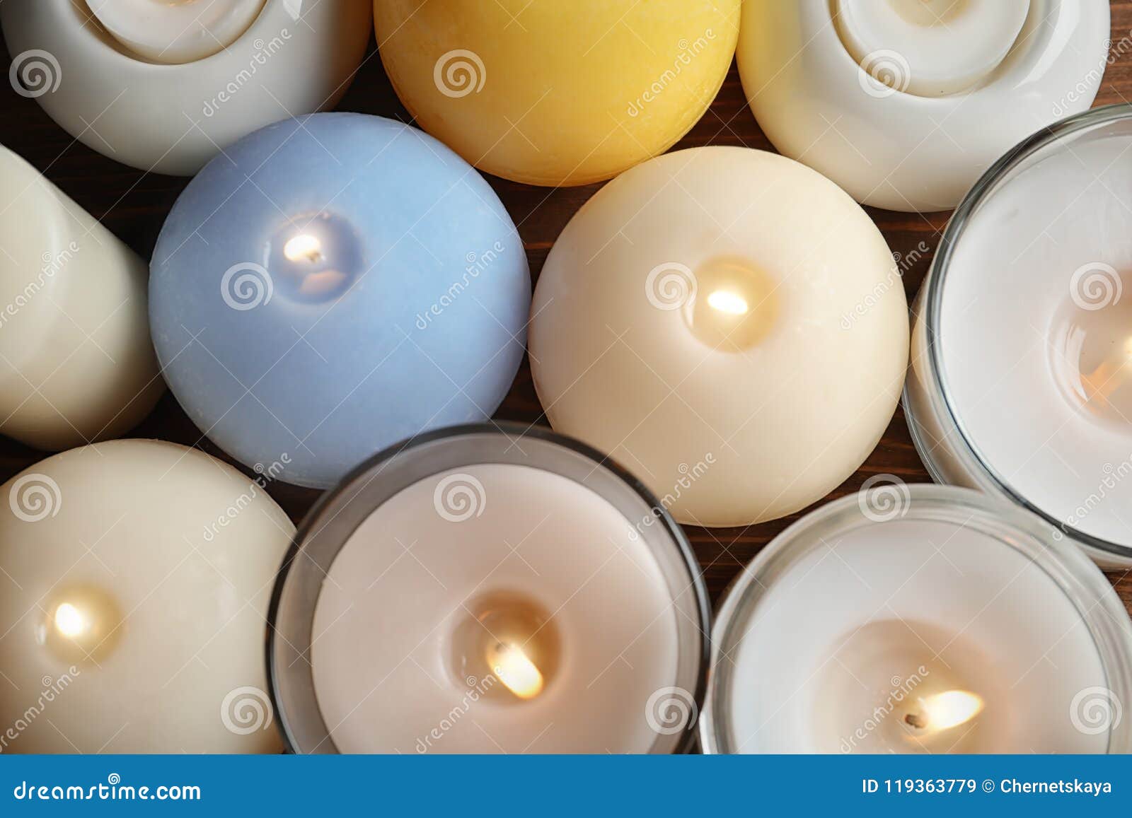 Burning Wax Candles of Different Shapes and Colors Stock Image - Image ...