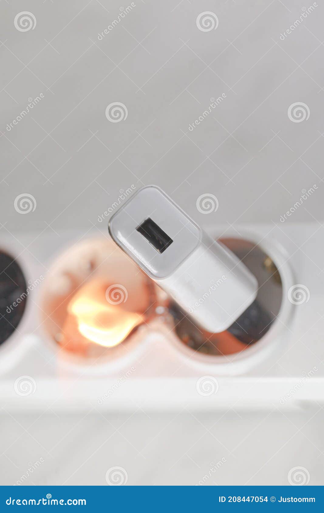 Burning of the Wire Cable and Socket Outlet Plug in the House Blurred ...