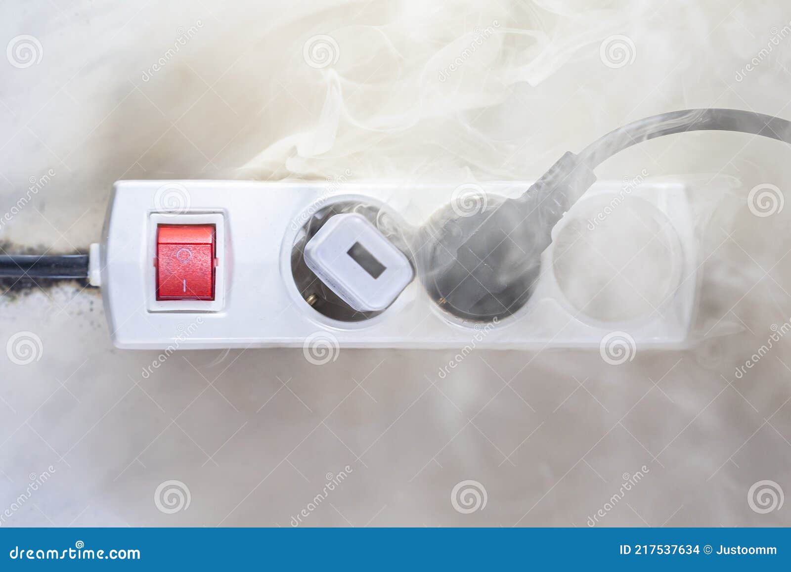 Burning of the Wire Cable and Socket Outlet Plug in the House, Blurred ...