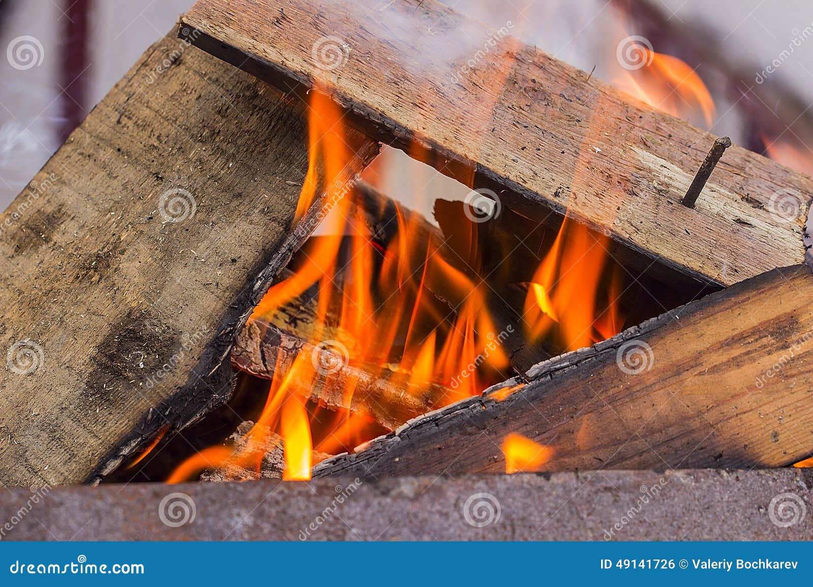 Burning wood in a brazier stock photo. Image of smoke - 49141726