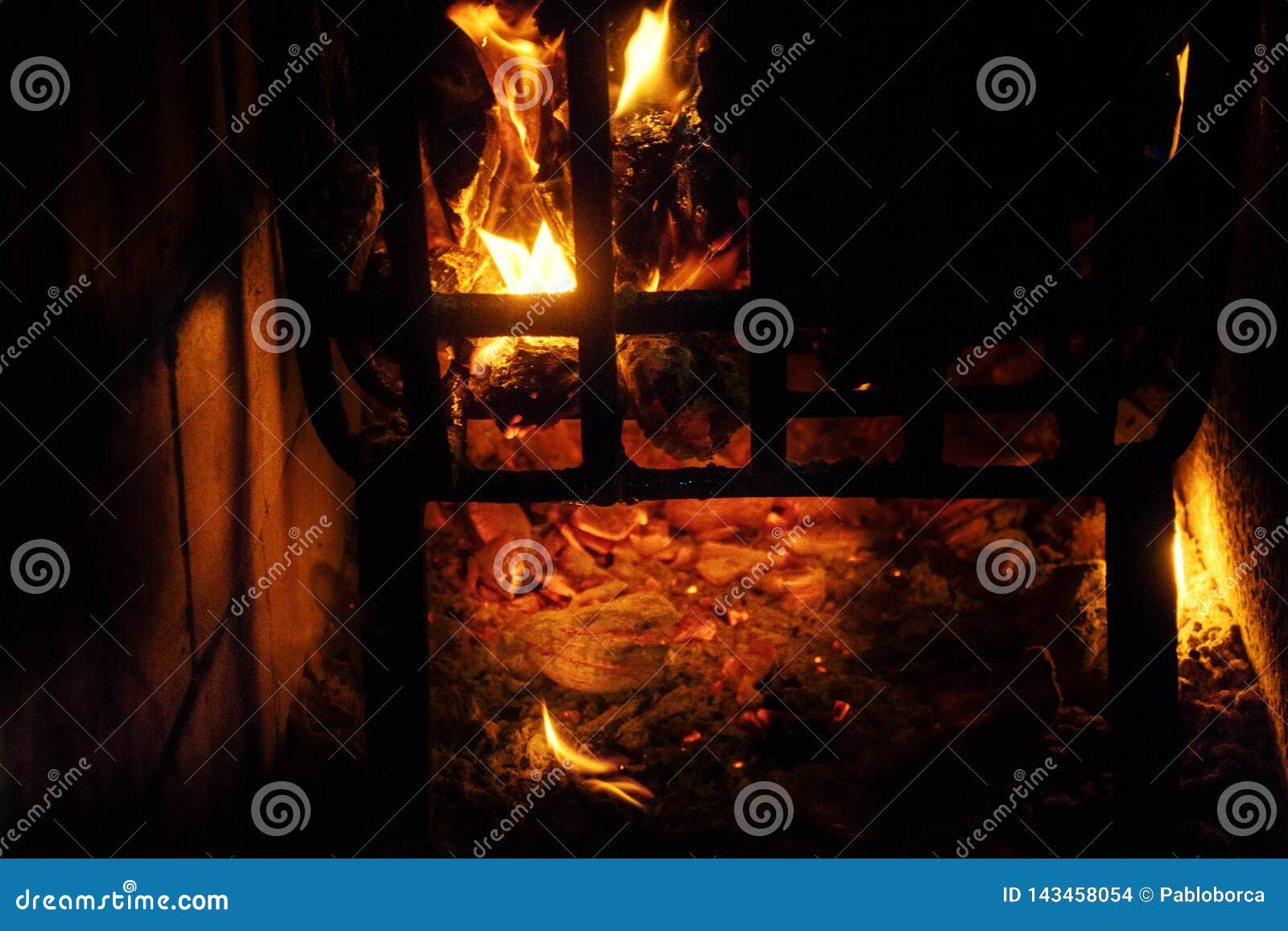 Burning wood in a brazier stock photo. Image of glow - 143458054