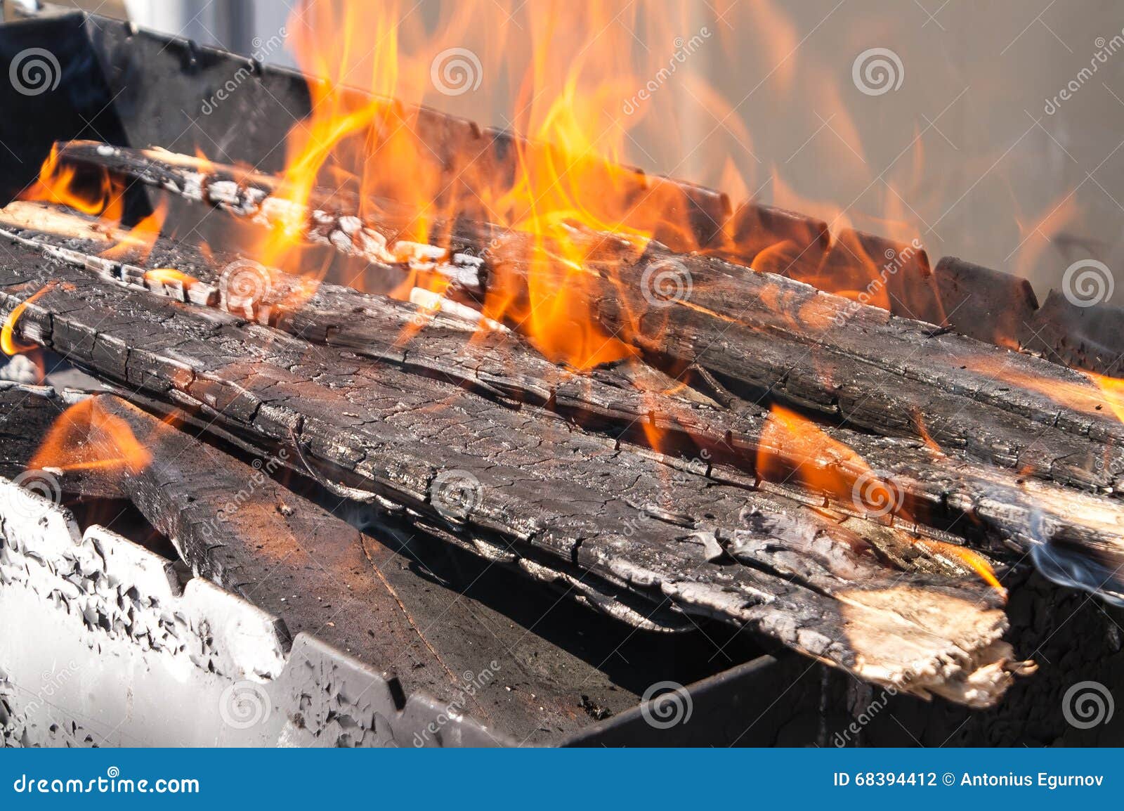 Burning wood brazier stock photo. Image of fire, kettle - 68394412