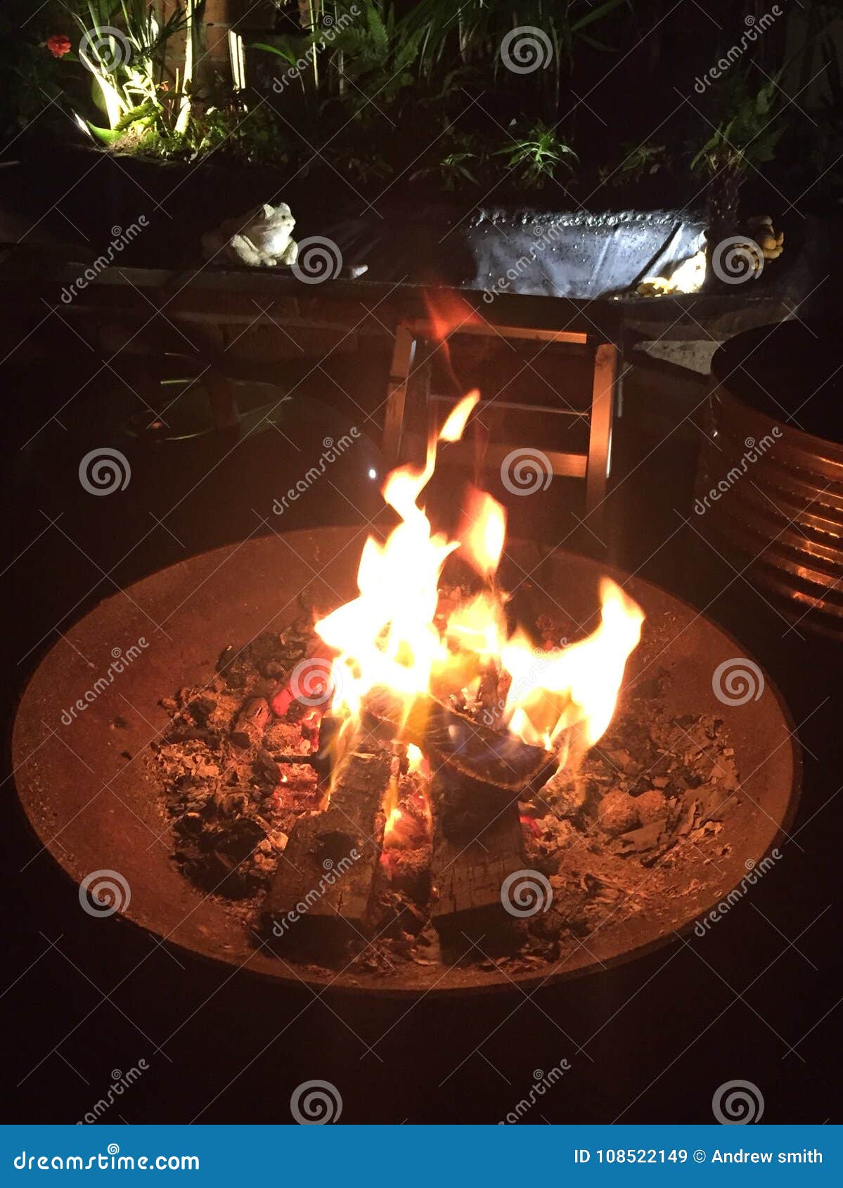 Fire pit stock image. Image of night, wood, burning - 108522149