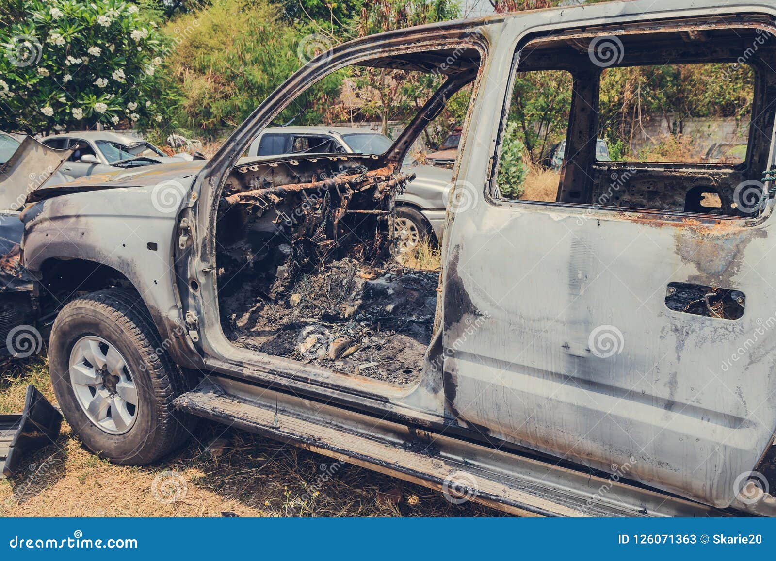 Burnt Out Car, Burnt Out Car After Accident. Engine Block, Front Axle ...