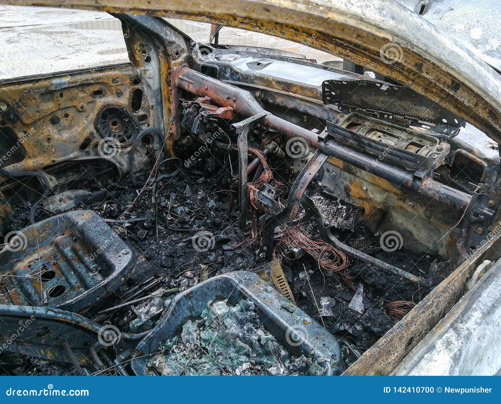 Burnt car on the road stock photo. Image of damage, front - 142410700