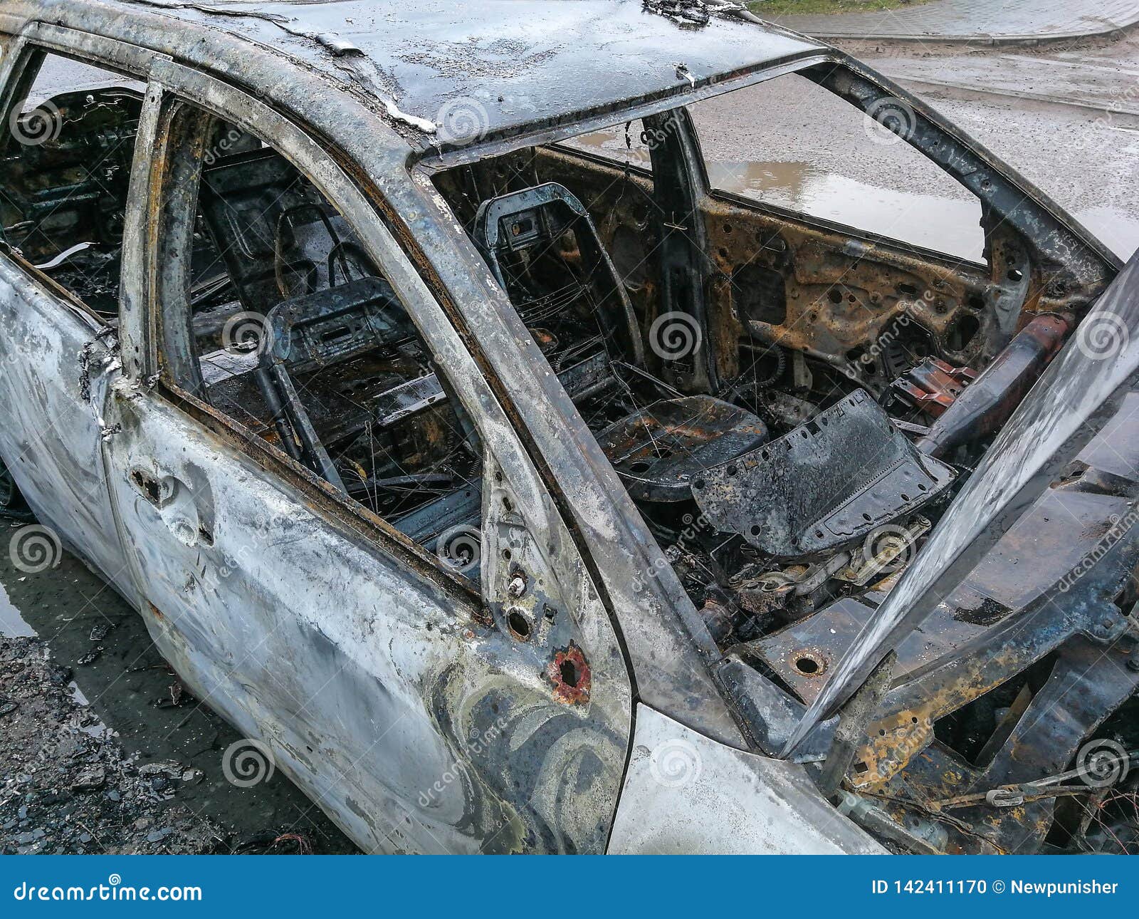 Burnt car on the road stock photo. Image of recycling - 142411170