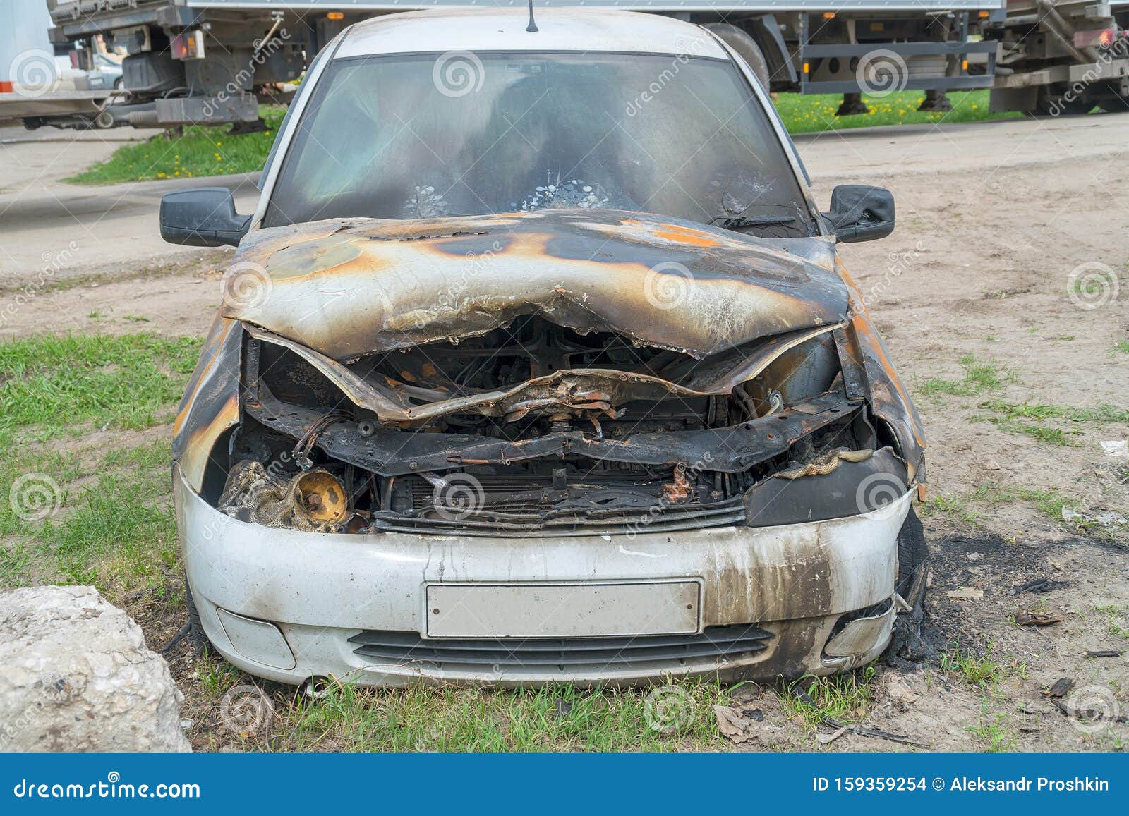 Burnt car on the street stock photo. Image of illegal - 159359254