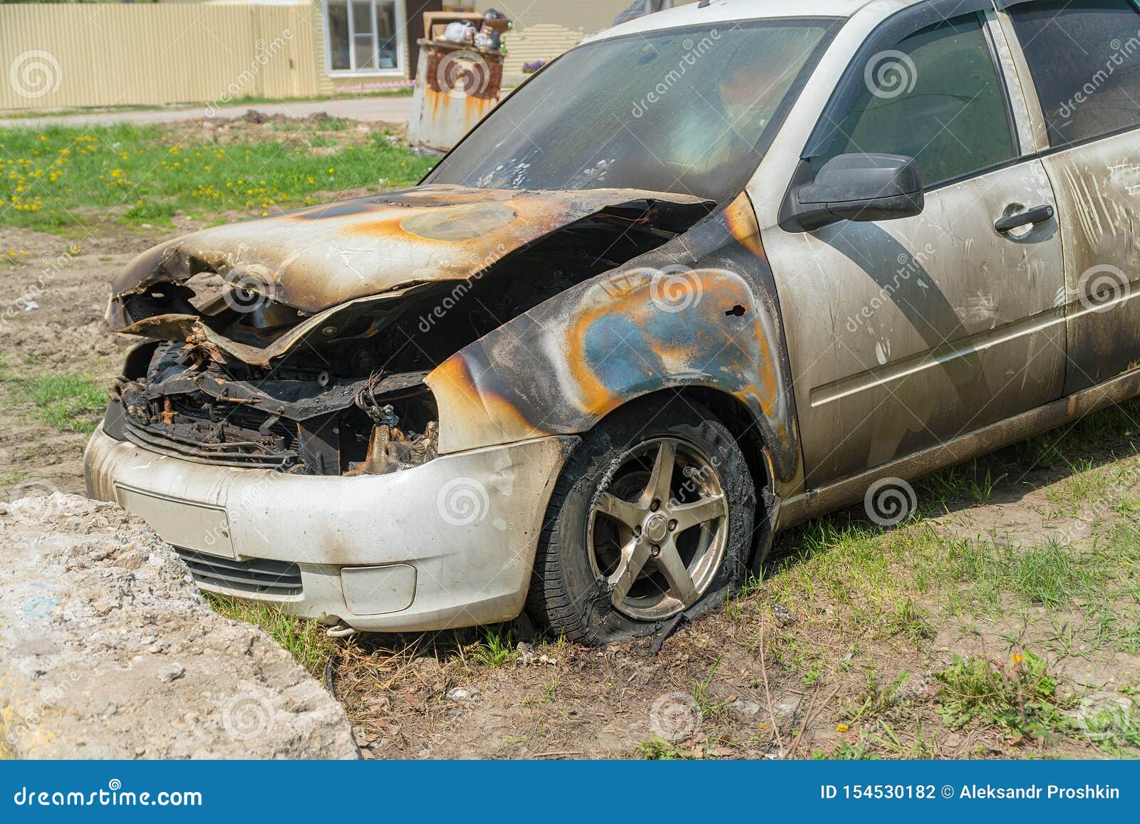 Burnt car on the street stock photo. Image of riding - 154530182