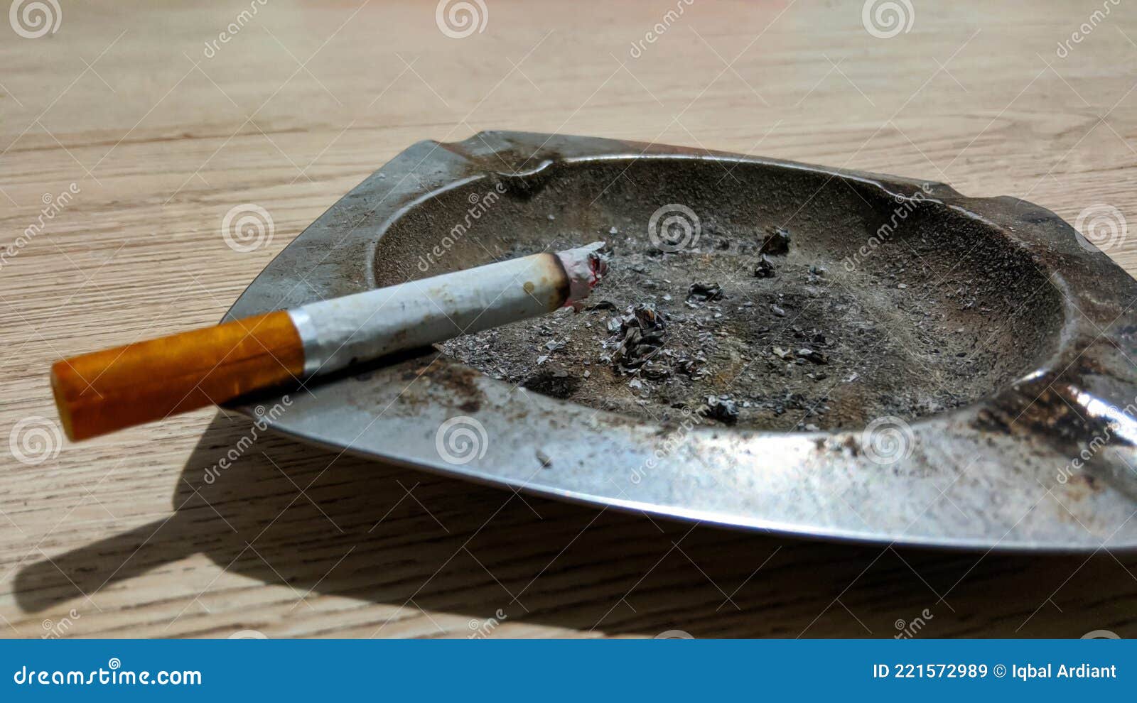 Burnt Cigarettes are Placed in the Ashtray. Stock Image - Image of ...