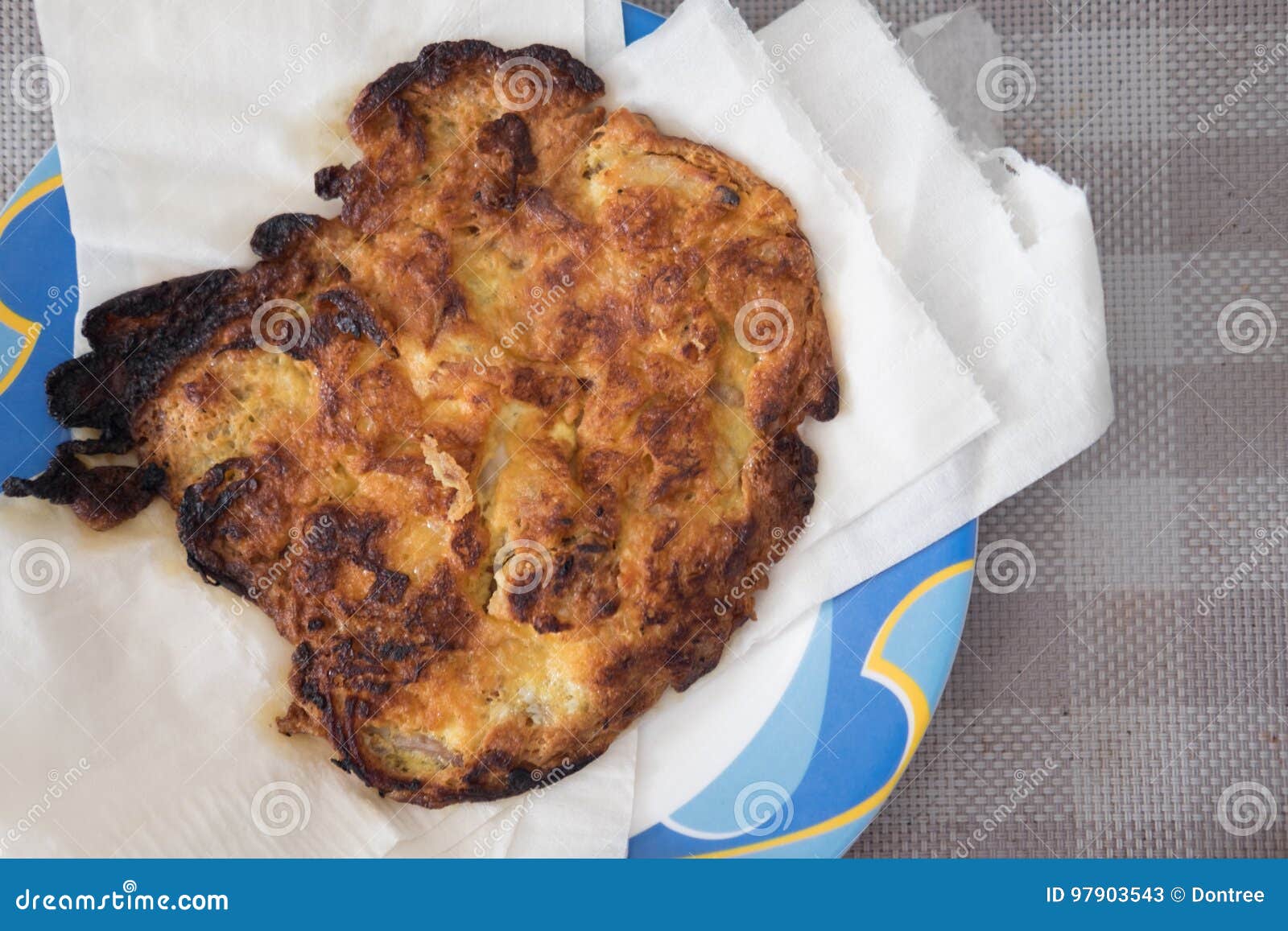Burnt egg on dish stock image. Image of crisp, burned - 97903543