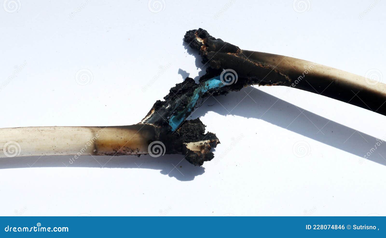 Burnt Wires On Wooden Floor, Closeup. Electrical Short Circuit Stock ...