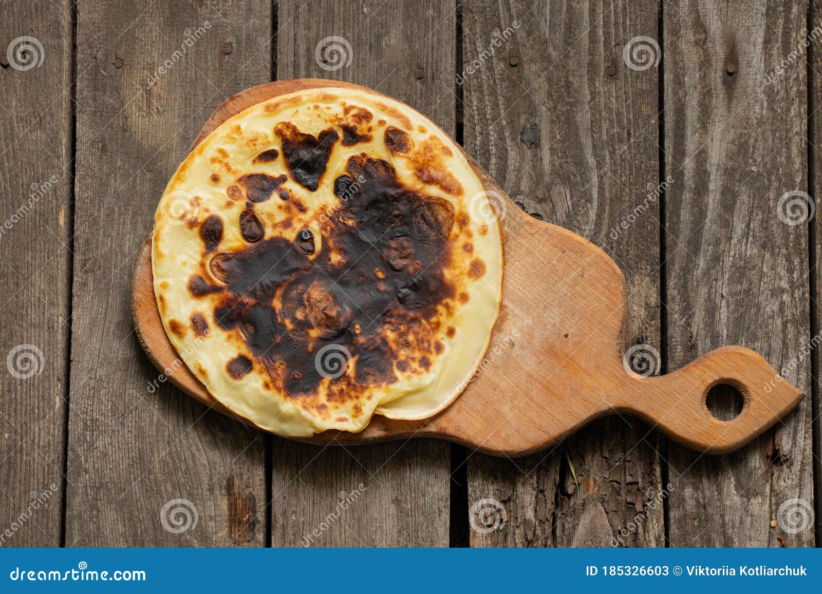 Burnt Fried Pancakes on a Blackboard on a Table in the Kitchen for ...