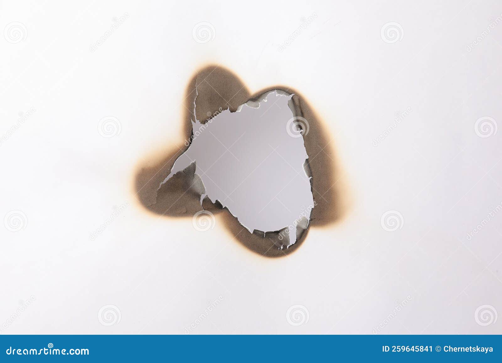 Burnt Hole in Paper on White Background Stock Image - Image of idea ...