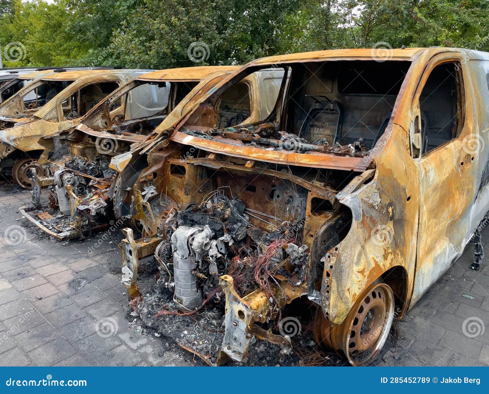 Burnt Out Cars in a Parking Space. Stock Image - Image of crash, rusty ...