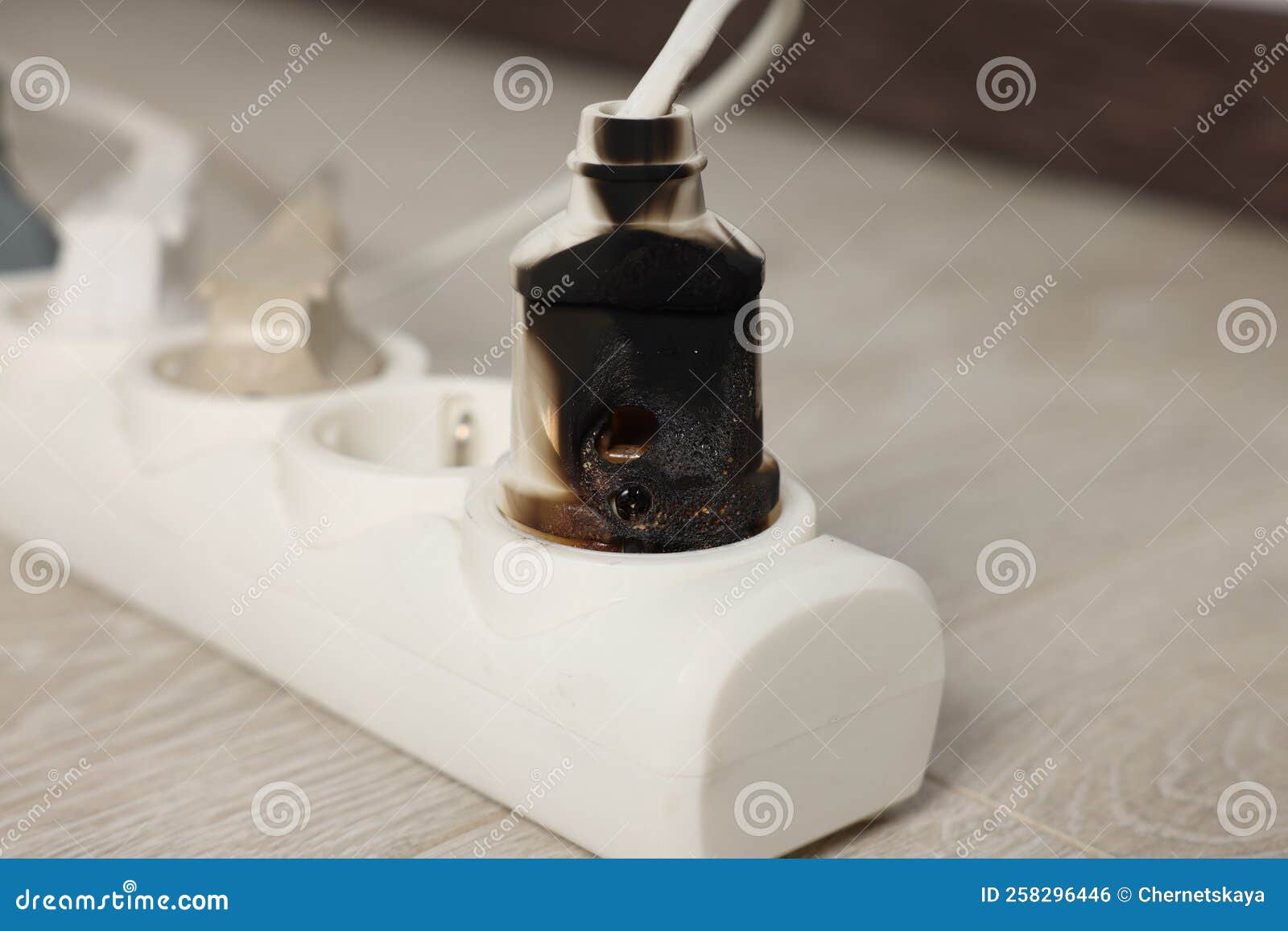 Burnt Plug in Power Strip Indoors, Closeup. Electrical Short Circuit ...