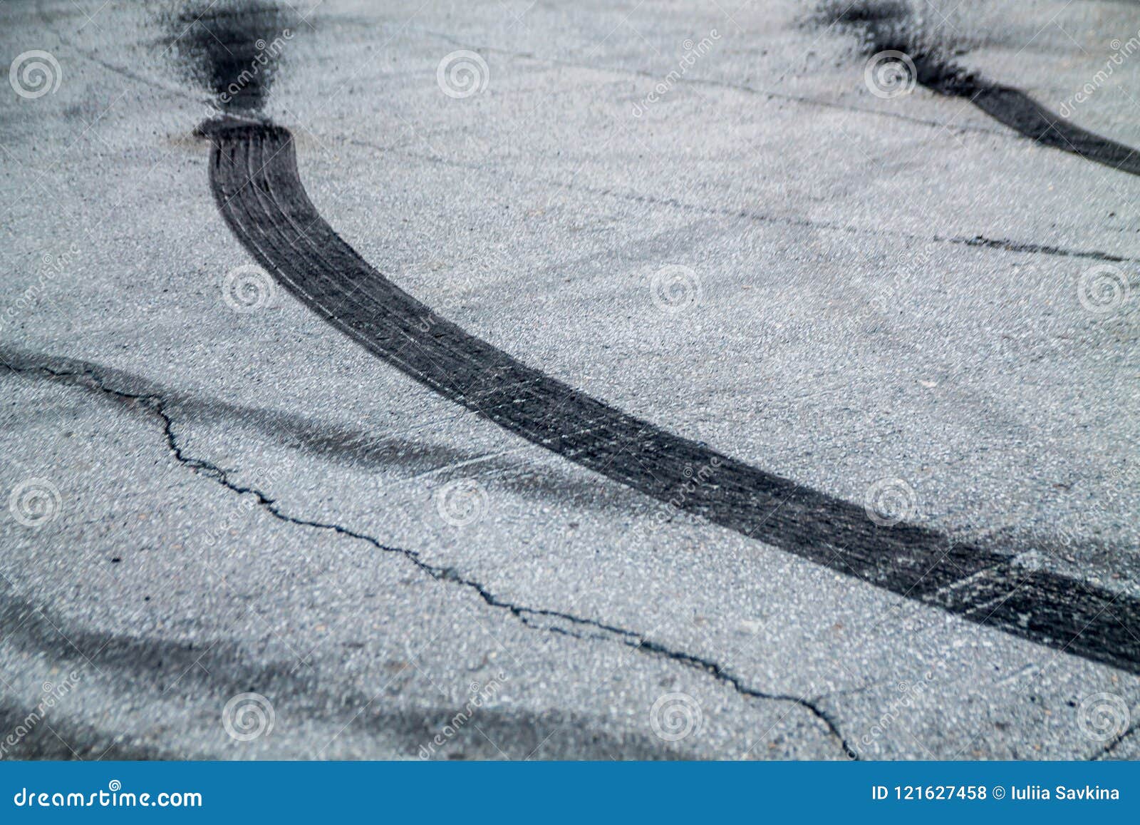 Burnt Rubber Traces on Asphalt Stock Photo - Image of rubber, gray ...