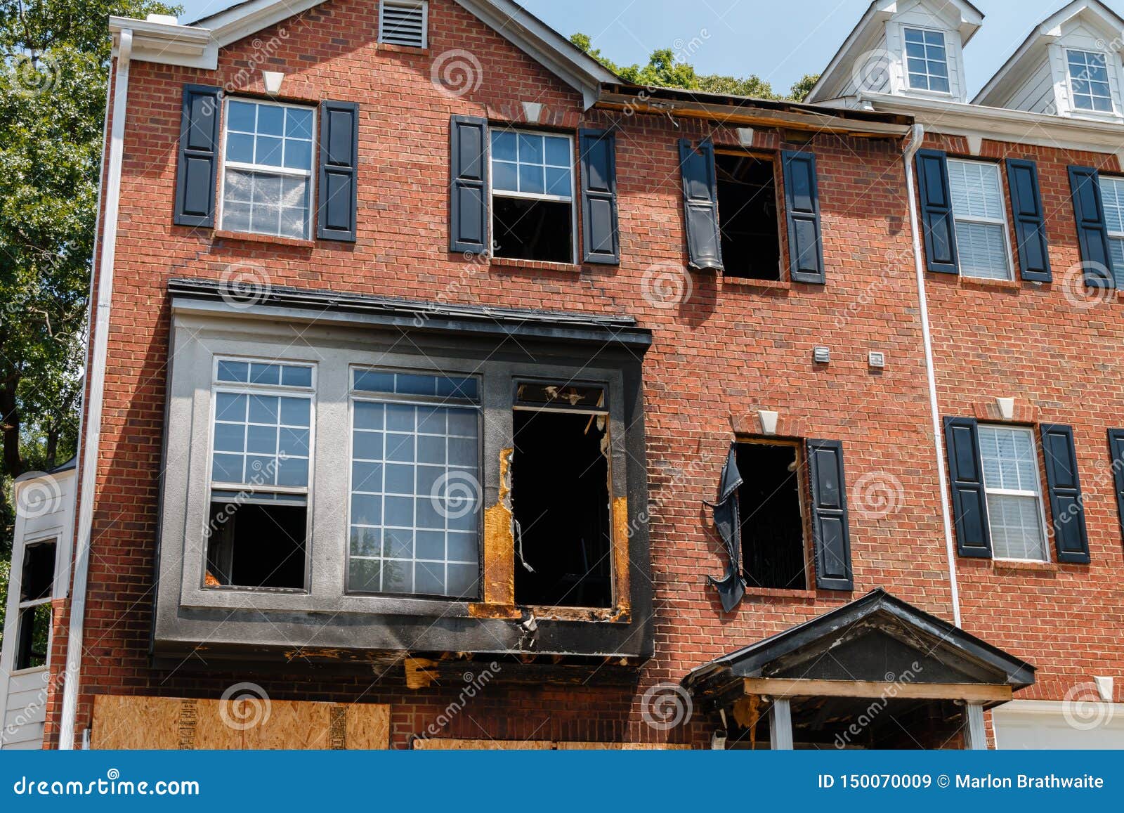 A Burnt Townhouse that Was on Fire. Stock Image - Image of insurance ...