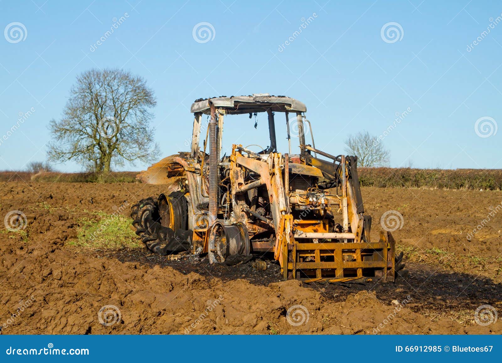 Burnt Tractor Digger in Ploughed Field Stock Image - Image of bonnet ...