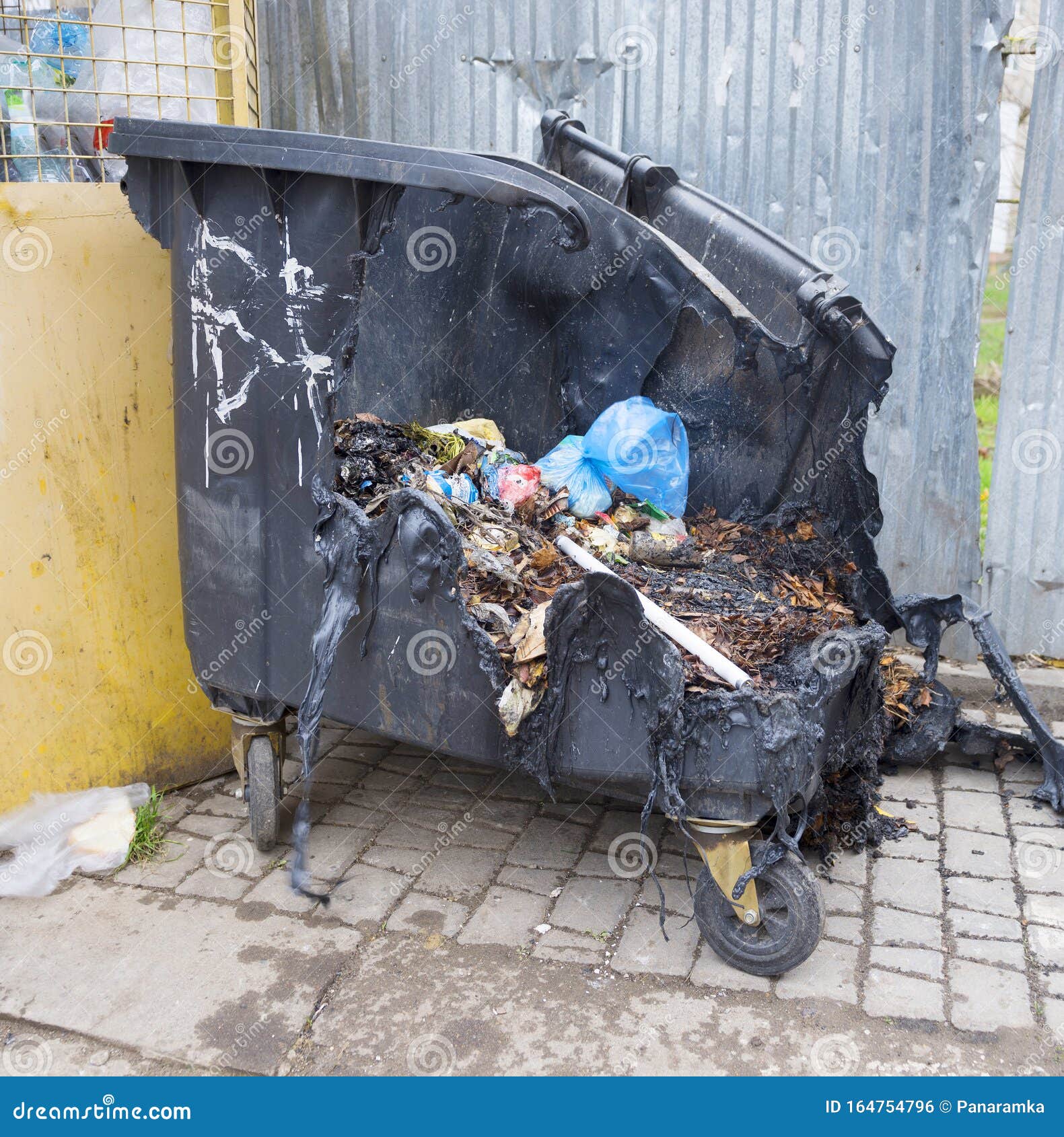 Burnt trash can stock photo. Image of burnt, demonstration - 164754796