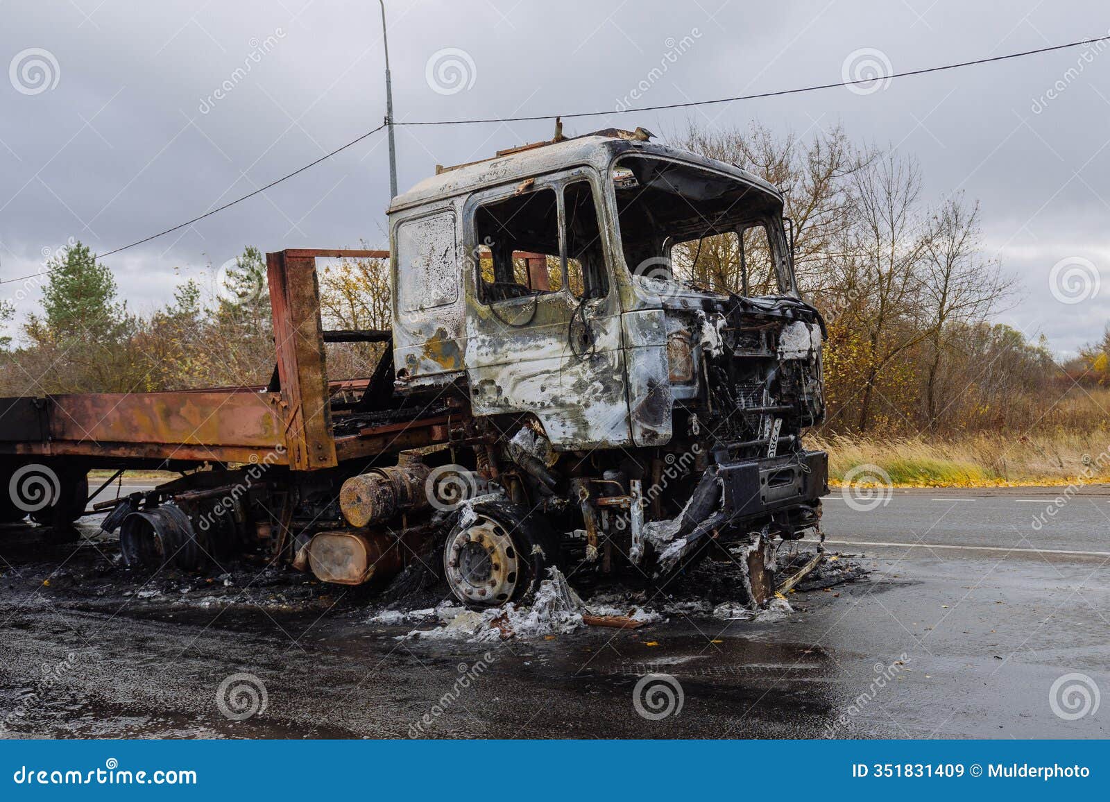 Burnt Truck on the Road. Fire or Attack Aftermath Stock Image - Image ...