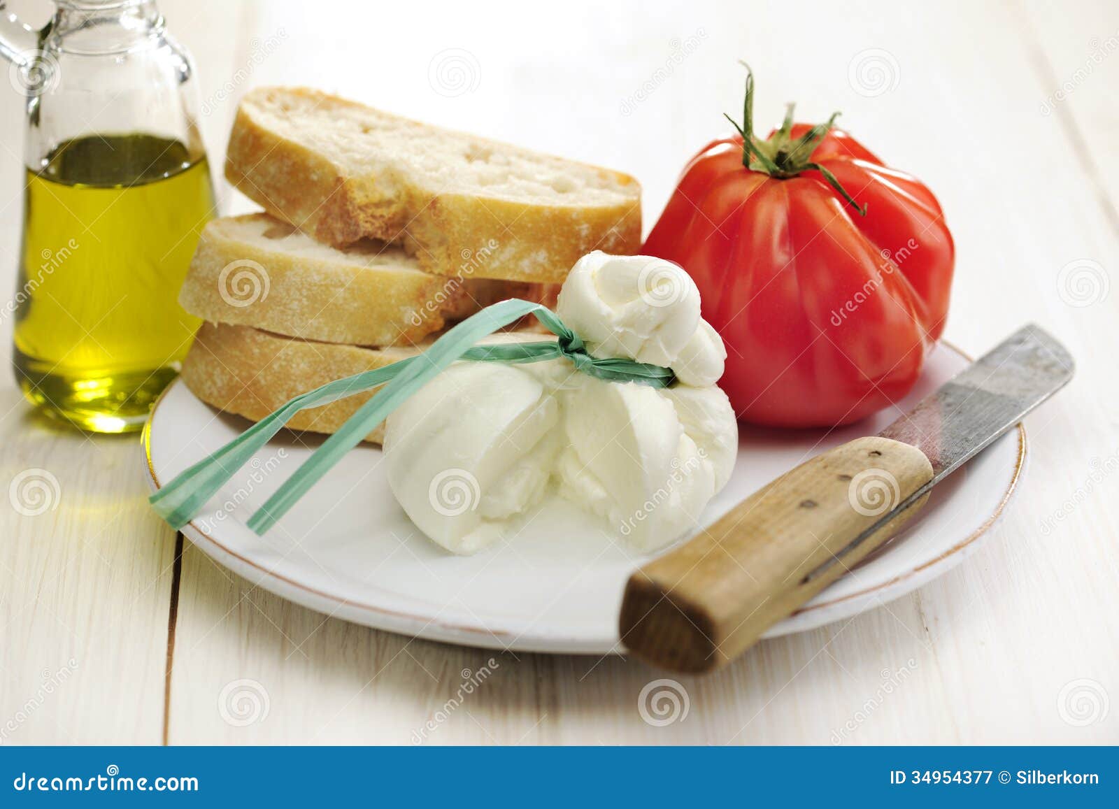 Burrata, tomato and bread stock image. Image of burrata - 34954377